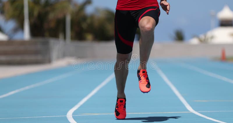 Sprinter Man Running Sprint Training on Athletics Track and Field ...