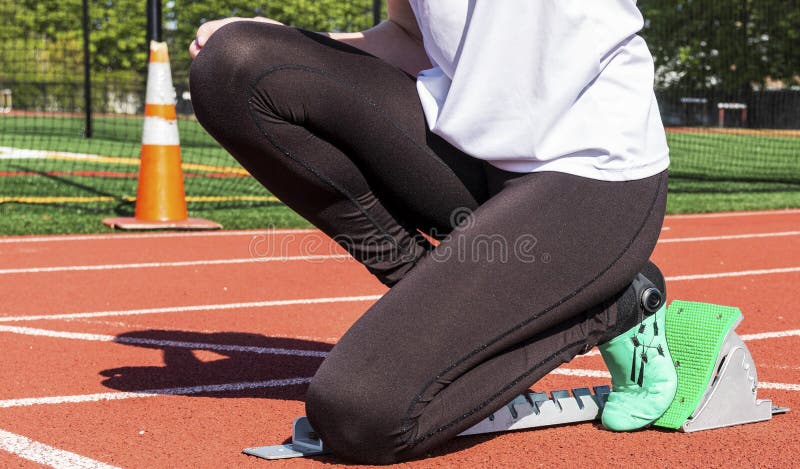 Sprinter Setting Up in the Starting Blocks Stock Image - Image of ...