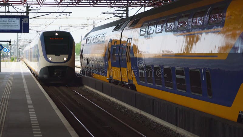 Sprinter Train Arriving at Train Station Stock Video - Video of modern ...