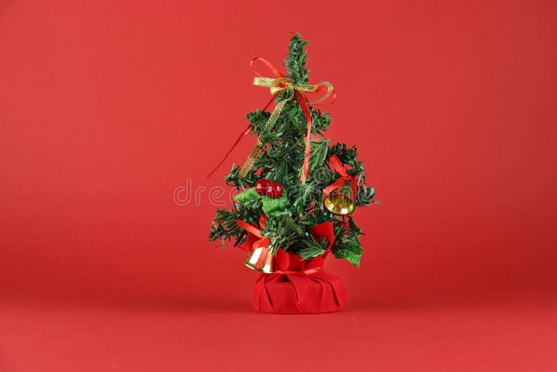 Spruce Branches with Christmas Decorations on a Red Monochromatic ...