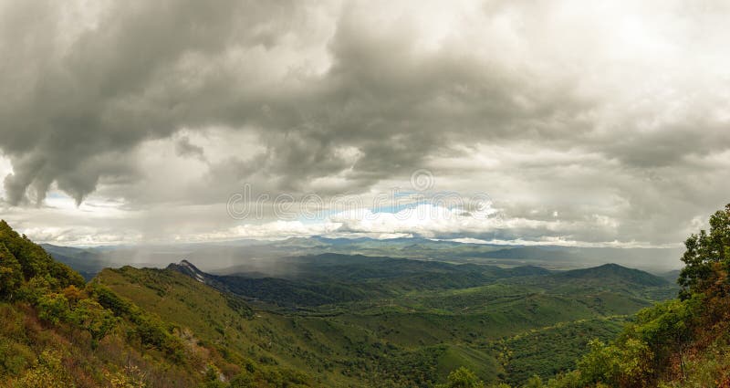 The Spurs of the Mountain are Covered with Clouds. Stock Image - Image ...