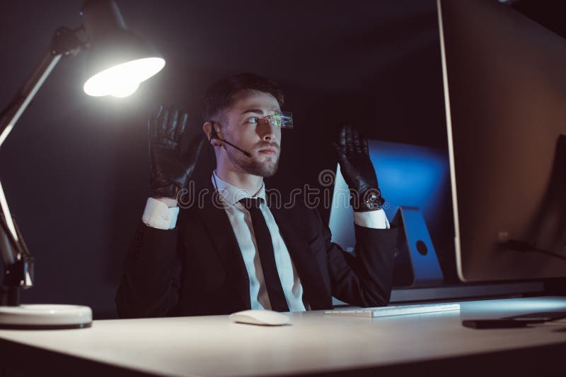 Spy Agent in Gloves with Hands Up Sitting at Table Stock Image - Image ...