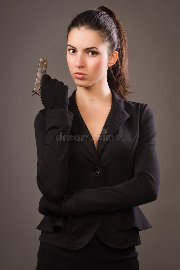 Spy Girl in a Black with Gun Stock Photo - Image of suit, sign: 33475978