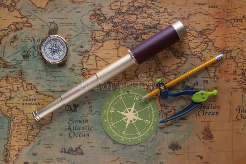 Spyglass, Compass, Pencil and Divider Lie on an Old Map. Stock Image ...