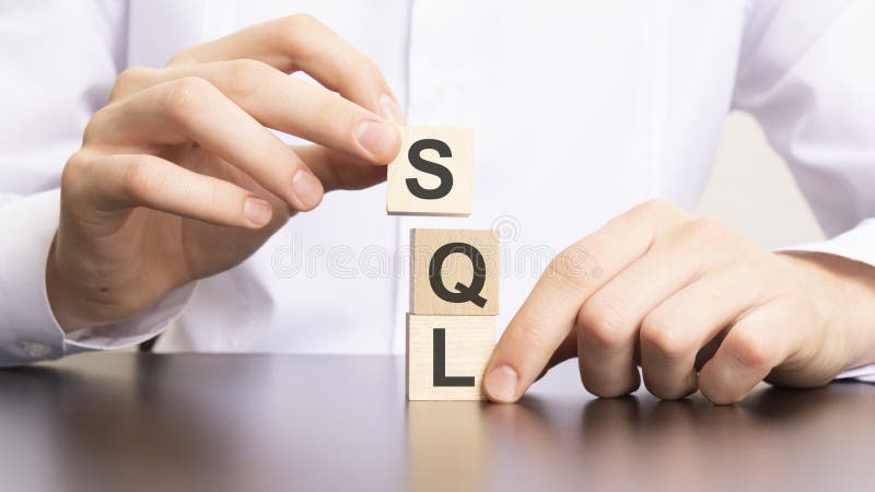 SQL, Sales Qualified Lead Text on Cube Blocks in Businessman Hands, Man ...