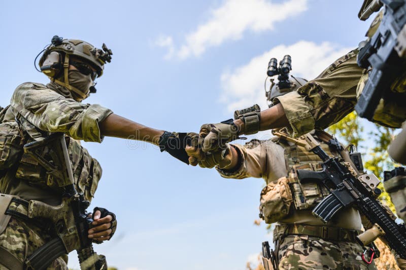 Squad of Soldiers with Teamwork Stacking Hands Together Stock Image ...
