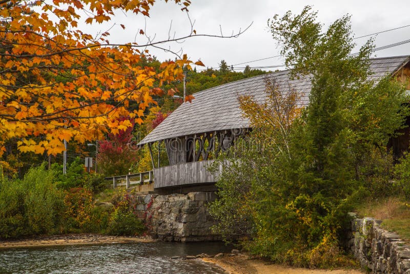 Squam river covered bridge stock image. Image of lake - 54359859