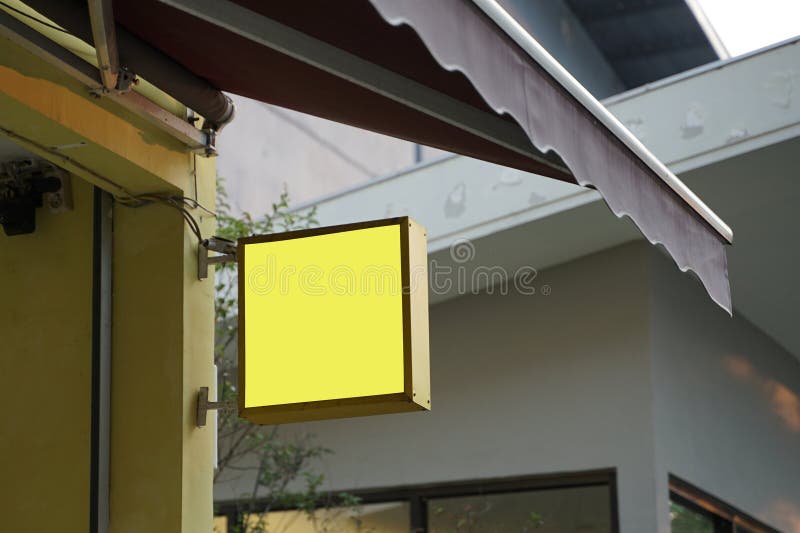 The Square Billboard Hangs on the Front Wall of the Shop Stock Image ...