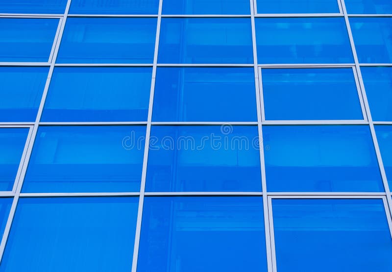 Square Windows of Office Building Reflect Distorted Architecture Stock ...