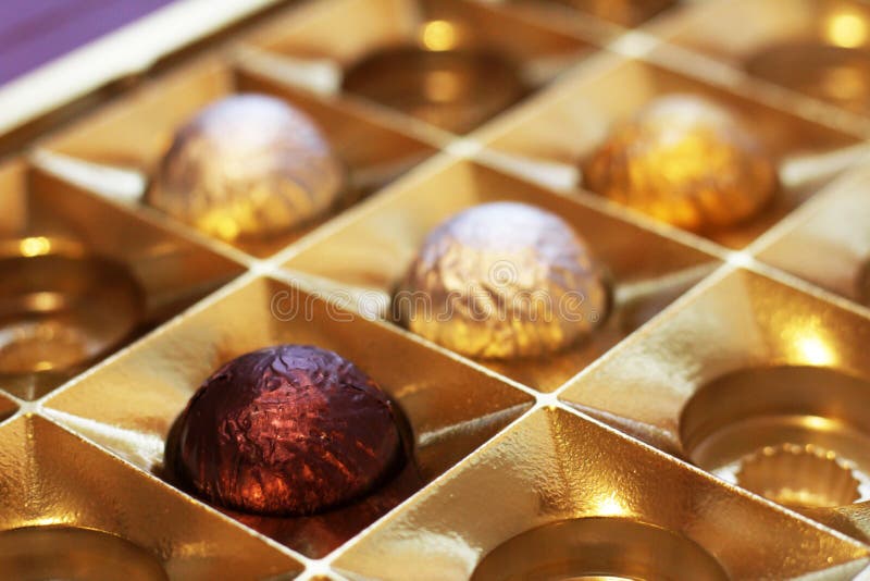 A square box of chocolates stock image. Image of holiday - 106143419