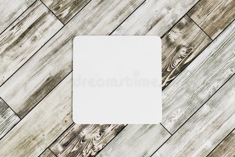 Square Coaster on Wooden Table Stock Image - Image of beverage, desk ...