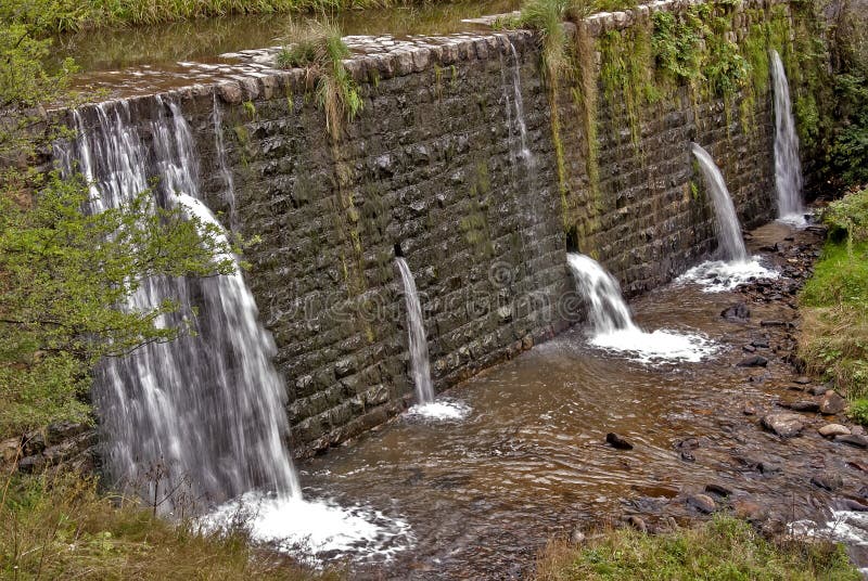 Square Concrete Blocks Dam on the River with Holes for Drain Water ...