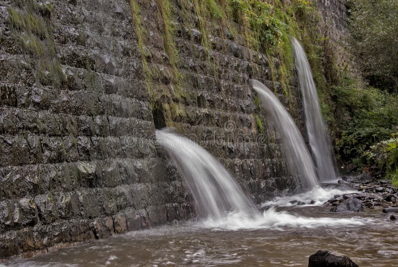 Square Concrete Blocks Dam on the River with Holes for Drain Water ...