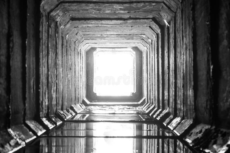 Square Concrete Drainage Tunnel with Light in the End Stock Photo ...