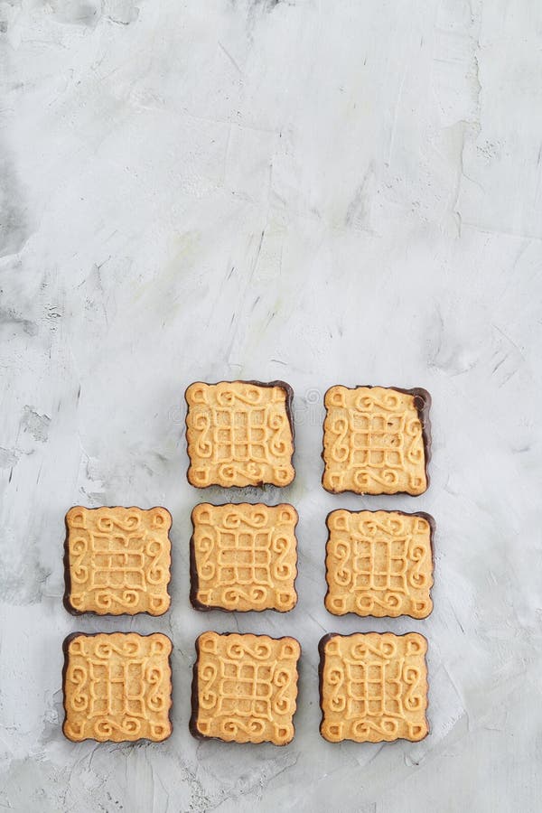 Square Biscuits Arranged in Pattern on Light Textured Background, Close ...