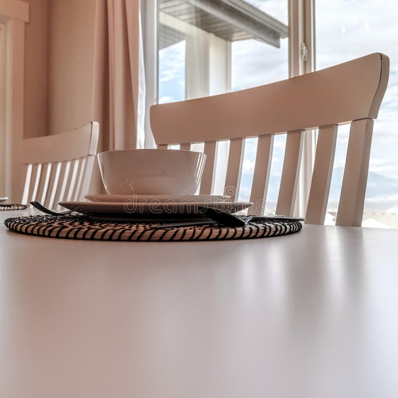 Square Crop Tableware and Utensils on Woven Placemat at the Dining ...