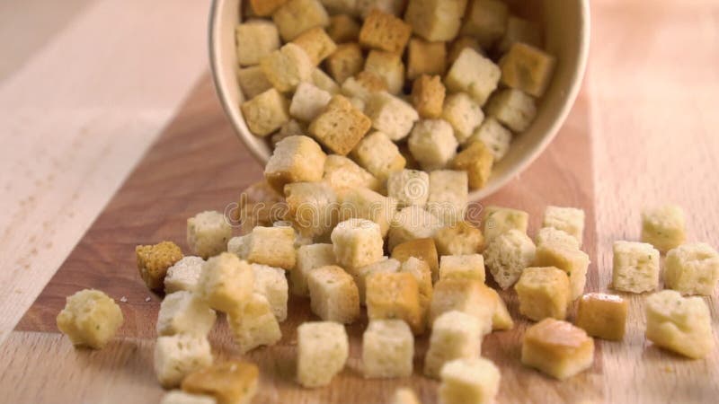 Square Cube Bread Crumbs are Scattered from a Falling Paper Cup on a ...