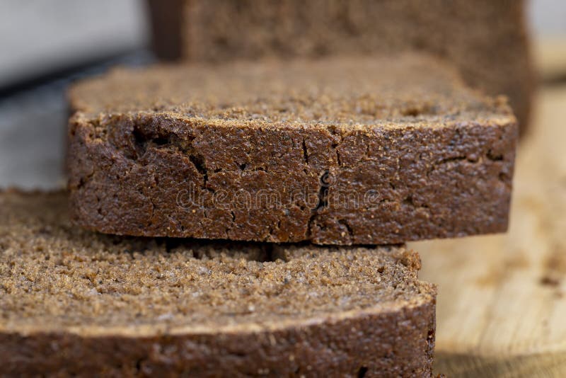 A Square Dark Loaf of Bread on the Table Stock Photo - Image of ...