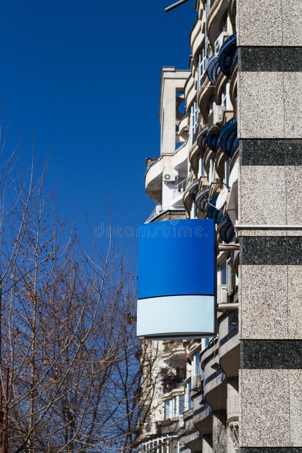 Square Empty Blue Signboard on a Building with Modern Architecture ...