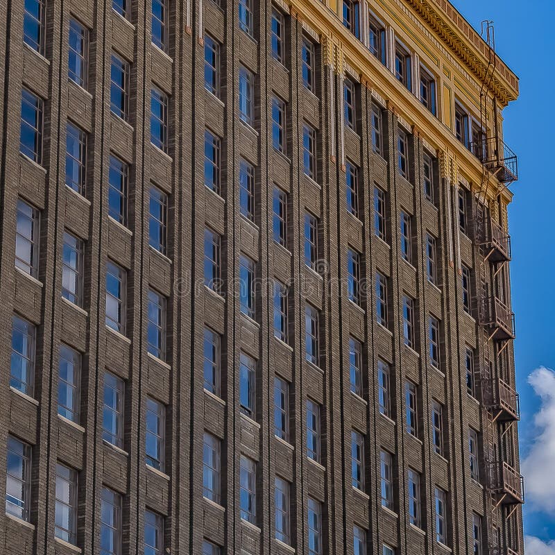 Square Exterior of a Commercial Building with Brick Wall and Flat Roof ...