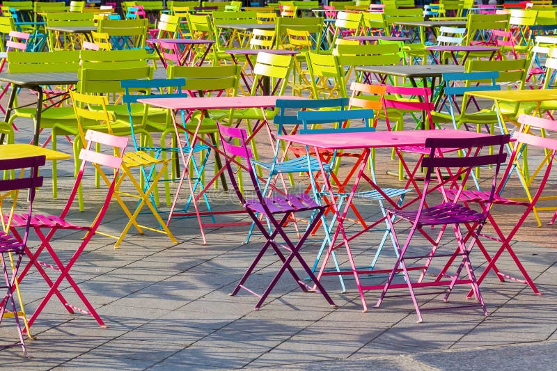Square Filled with Colorful Tables and Chairs Stock Photo - Image of ...