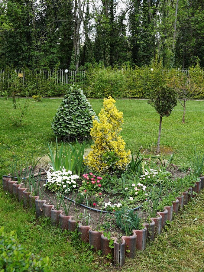 Square Flower Bed in Landscape Design in the Park Stock Image - Image ...