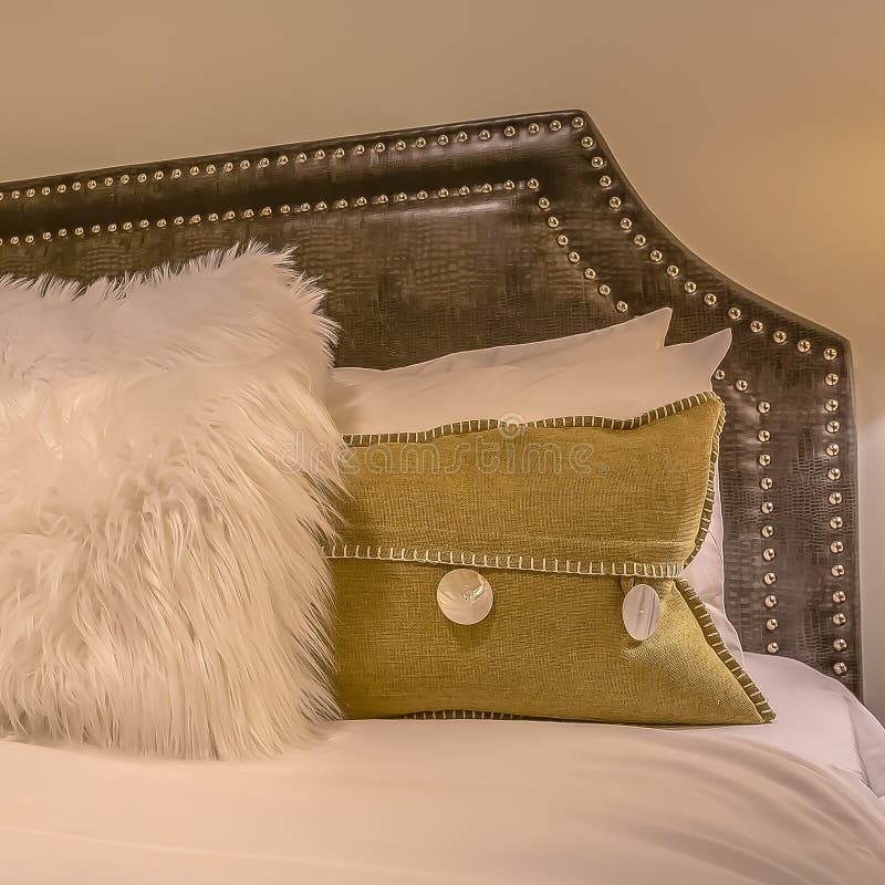 Square Bedroom Interior of Home with Built in Cabinets Over and on Both ...