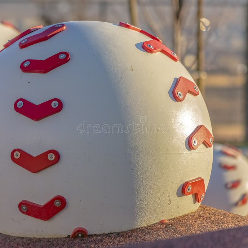 Square Frame Close Up of Huge Red and White Baseball Decoration at a ...