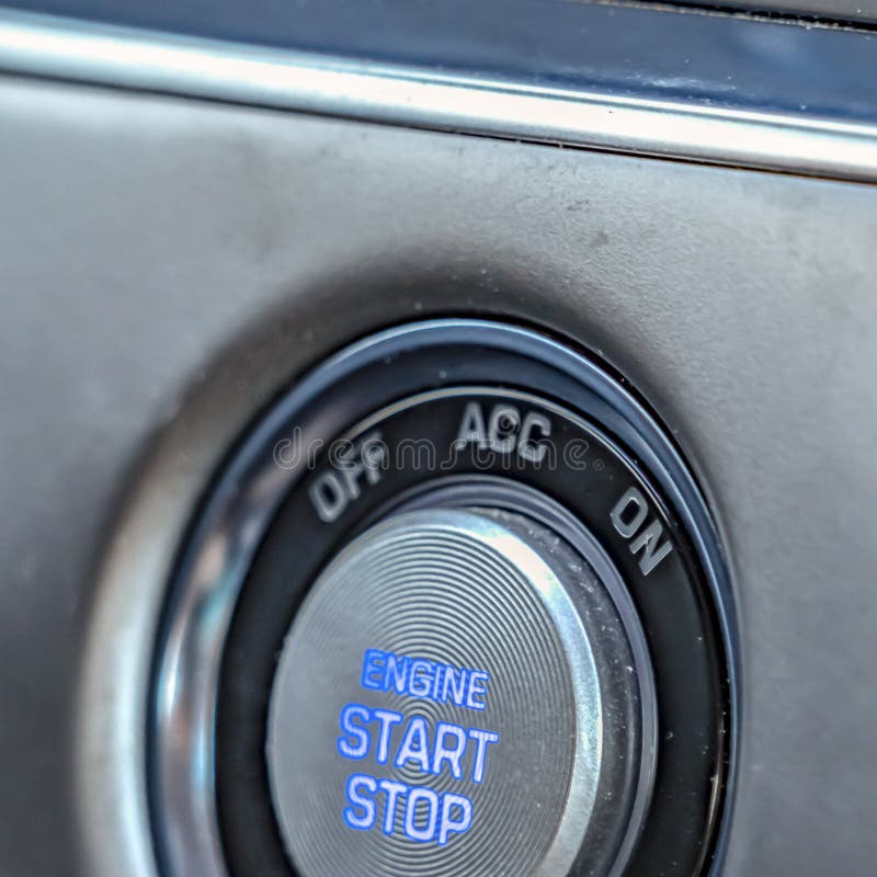 Square Frame Close Up View of an Engine Push Start and Stop Button ...