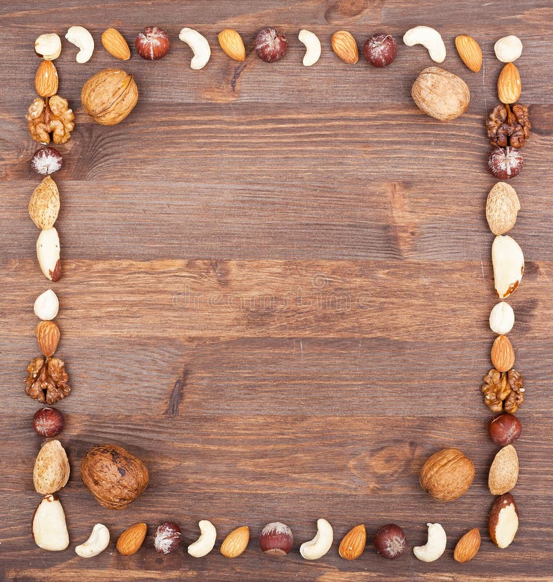 Border of Mixed Nuts stock photo. Image of almond, energy - 24692256