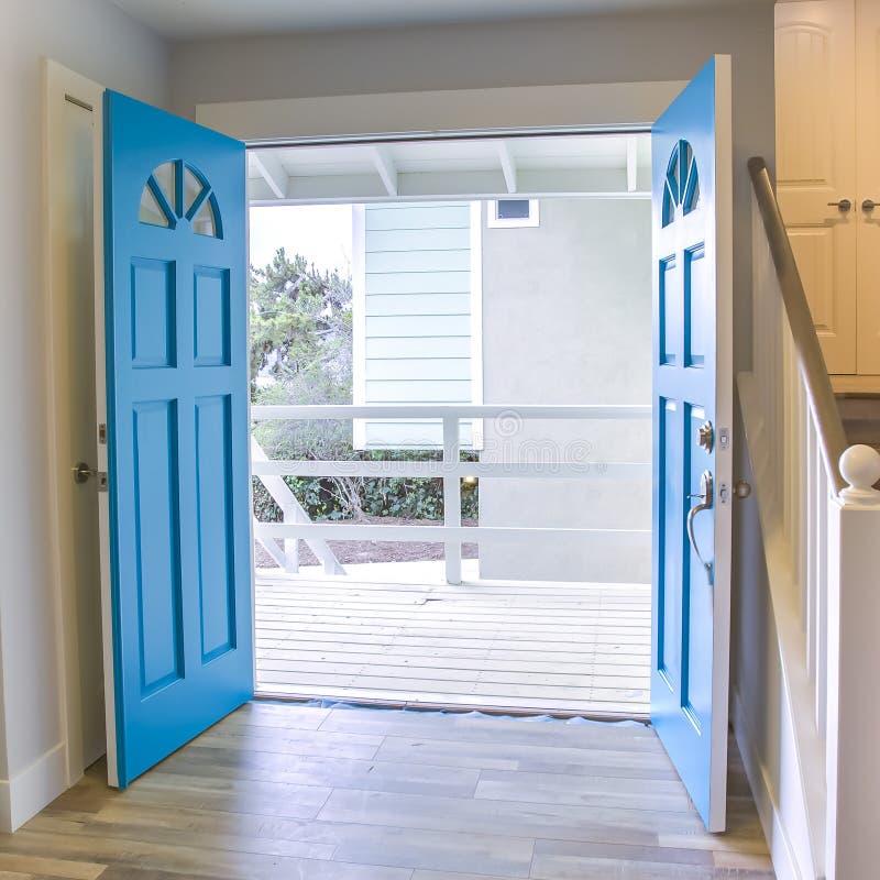 Square Frame Wide Open Front Doors with Townhome Stock Image - Image of ...