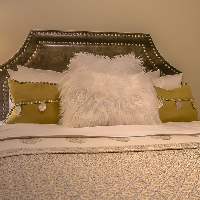 Square Bedroom Interior of Home with Built in Cabinets Over and on Both ...