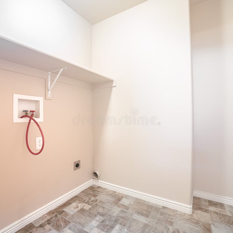 Square Frame Empty Laundry Room with Service Connections Interior Stock ...
