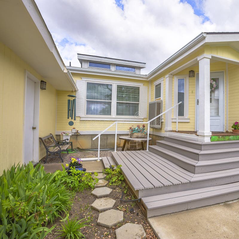 Square Frame Home Exetrior with Wrap Around Steps and Columns on the ...