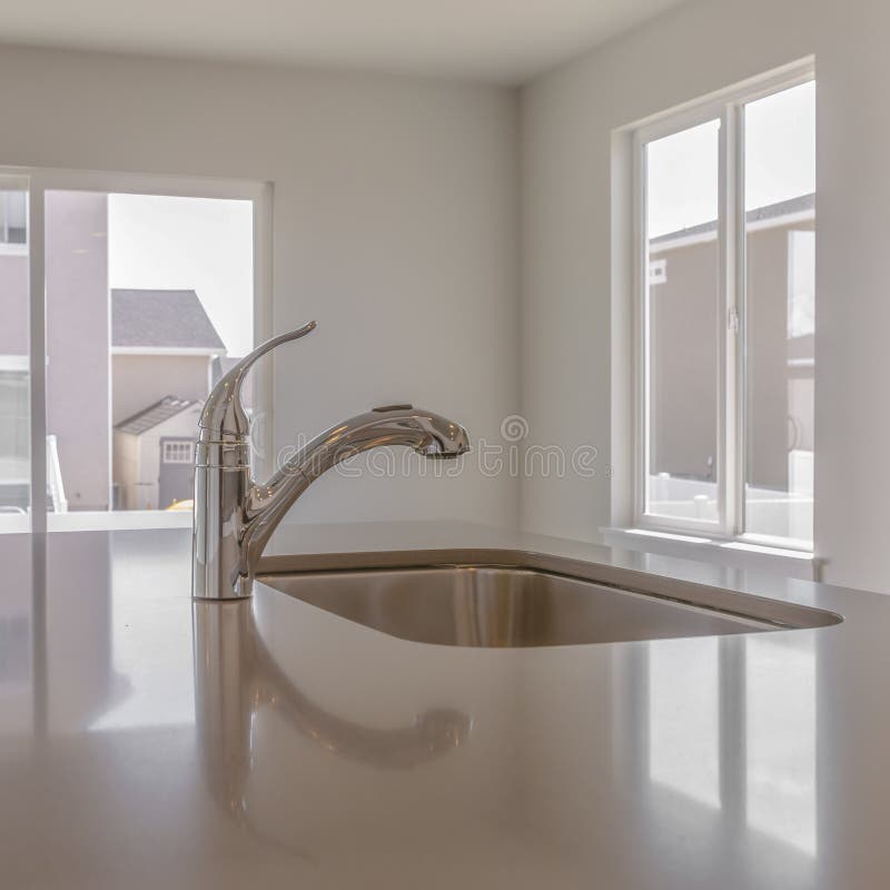 Square Frame Interior of a Kitchen with Sink and Faucet on the Glossy ...