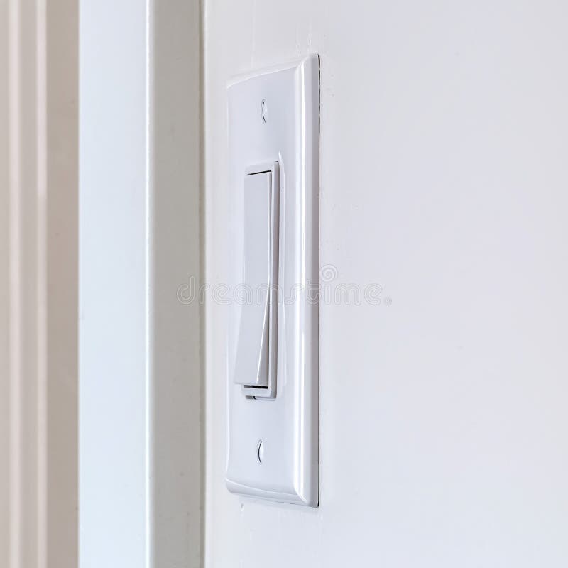 Square Frame Side View of Electrical Rocker Light Switch Mounted on ...