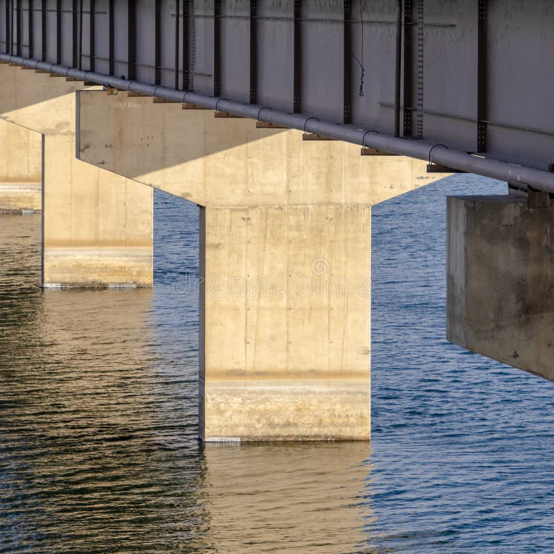 Square Frame View of the Abutments Underneath a Beam Bridge Supporting ...