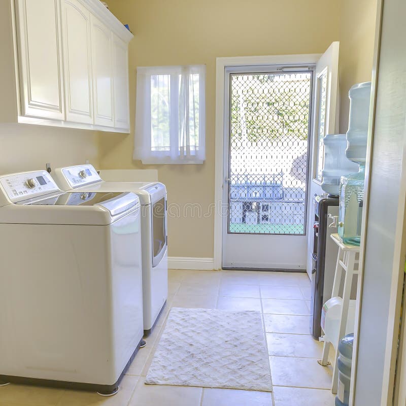 Square Laundry Area in a Fallbrook Home Stock Image - Image of room ...