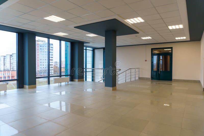 Square Fluorescent Lamps on the Ceiling. Thick Pipes of the Air ...