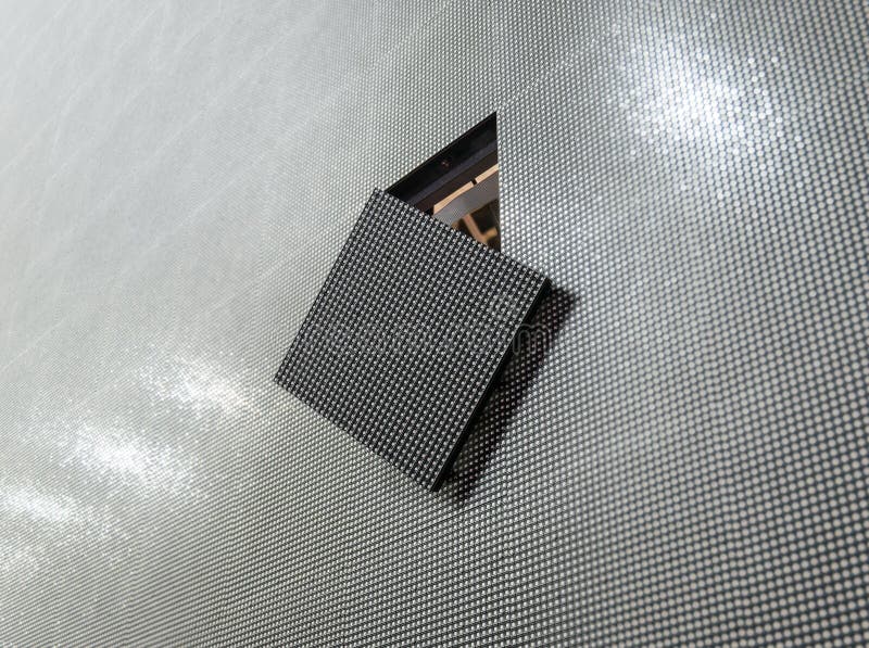 A Square LED Module Fallen Out of Its Place on the Surface of a Large ...