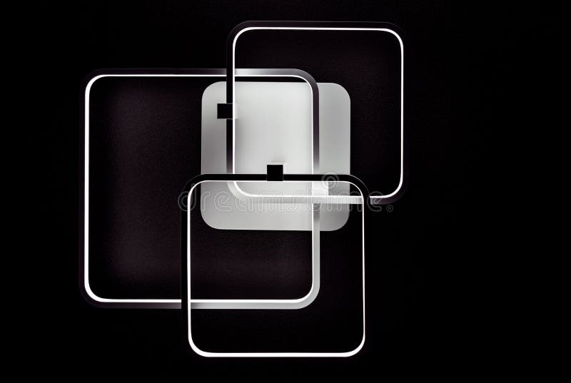 Square LED Wall Lights on a Black Background. LED Lighting in a Modern ...