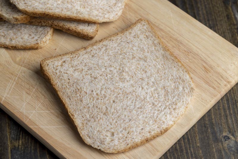 Square Loaf of Light Wheat Bread Cut into Pieces Stock Photo - Image of ...