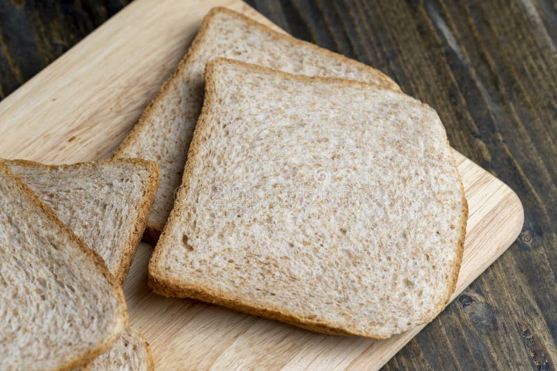 Square Loaf of Light Wheat Bread Cut into Pieces Stock Photo - Image of ...
