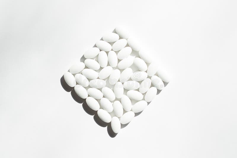 Square Made of White Pills on a Sunny White Background Stock Photo ...