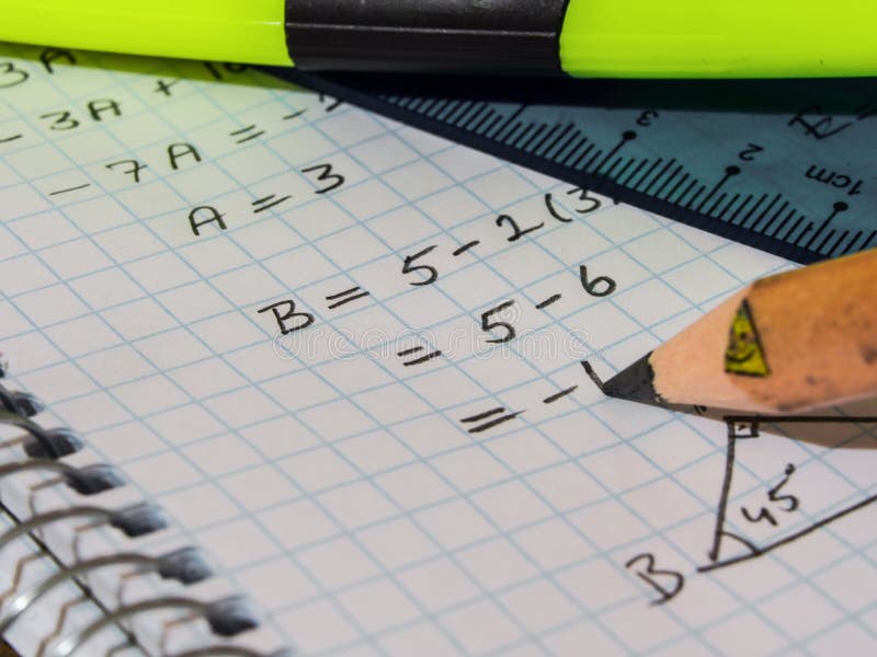 Square Mathematics Student Book, and Colored Pencil on it Stock Photo ...