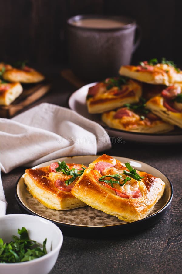 Square Mini Pizza with Tomato, Sausage and Cheese on a Plate for a ...