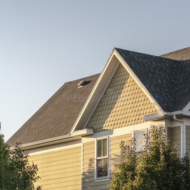 Square Modern Timber Clad House with Textured Wall Stock Image - Image ...