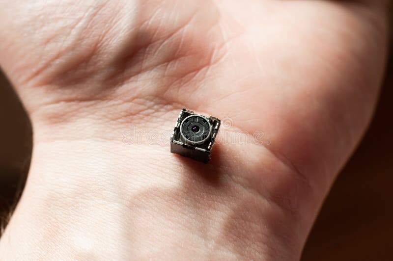 A Square Module of a Small Camera Sewn into a Human Hand Stock Image ...