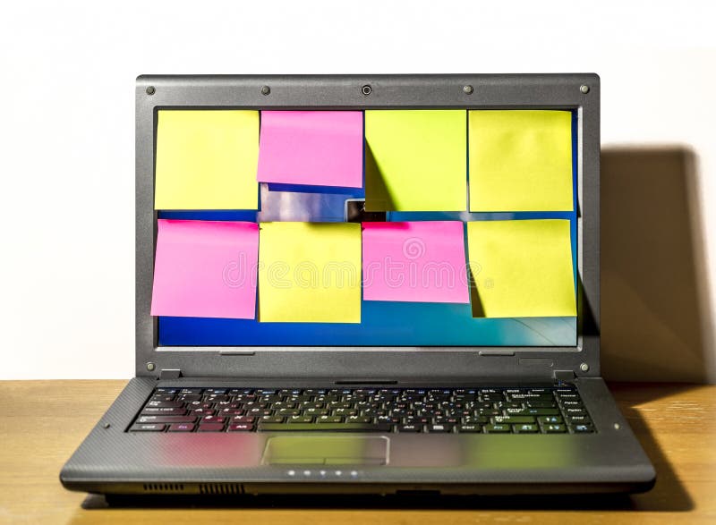 Square Multi-colored Reminder Sheets are Pasted on the Laptop Screen ...
