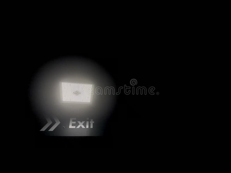A Square Lamp Shines on an Exit Sign. Stock Image - Image of extreme ...